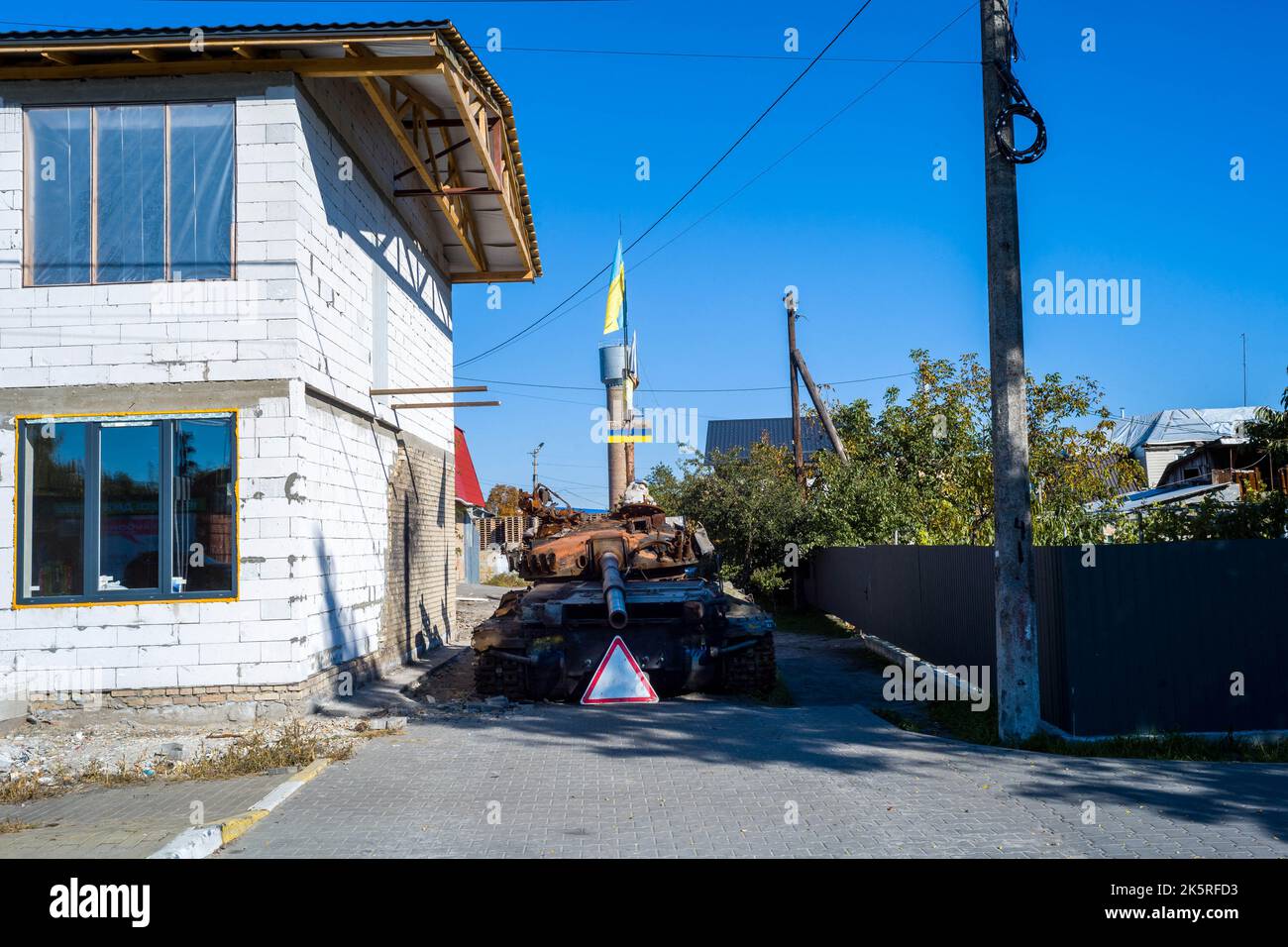A Ukrainian tank burned in a passage of Gostomel. Ukraine, Gostomel, on ...