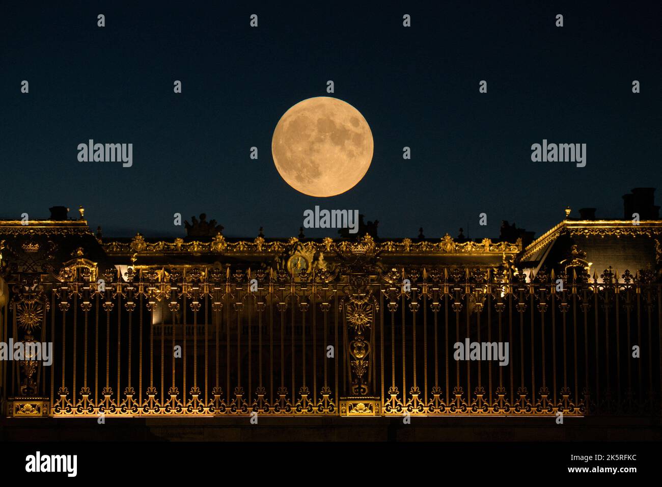 A full Hunter's moon rises over Chateau de Versailles, on October 9 ...
