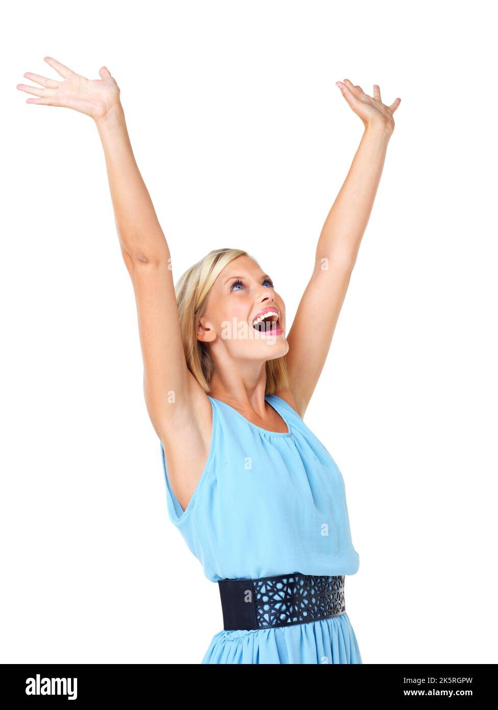 I feel so free. Young beautiful woman throwing her hands up in the air ...