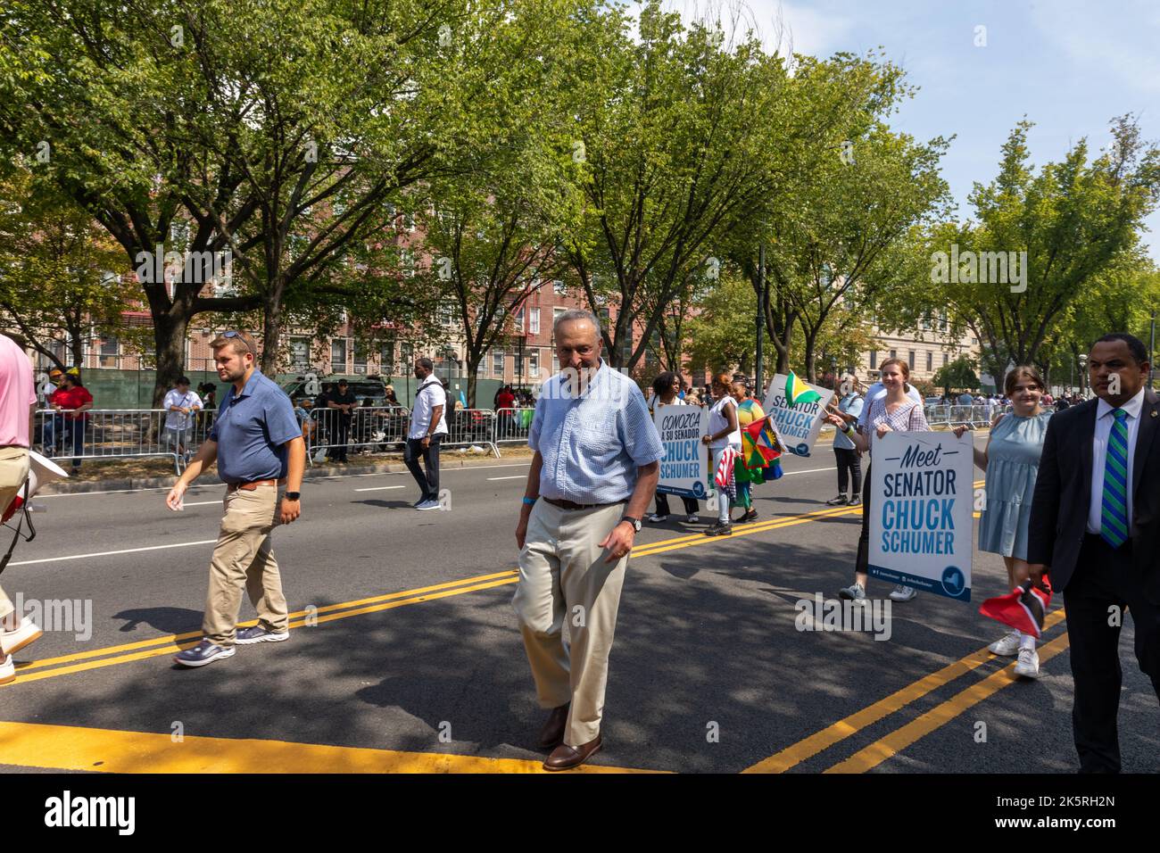 The people walking with Chuck Schumer at the West Indian Labor Day ...