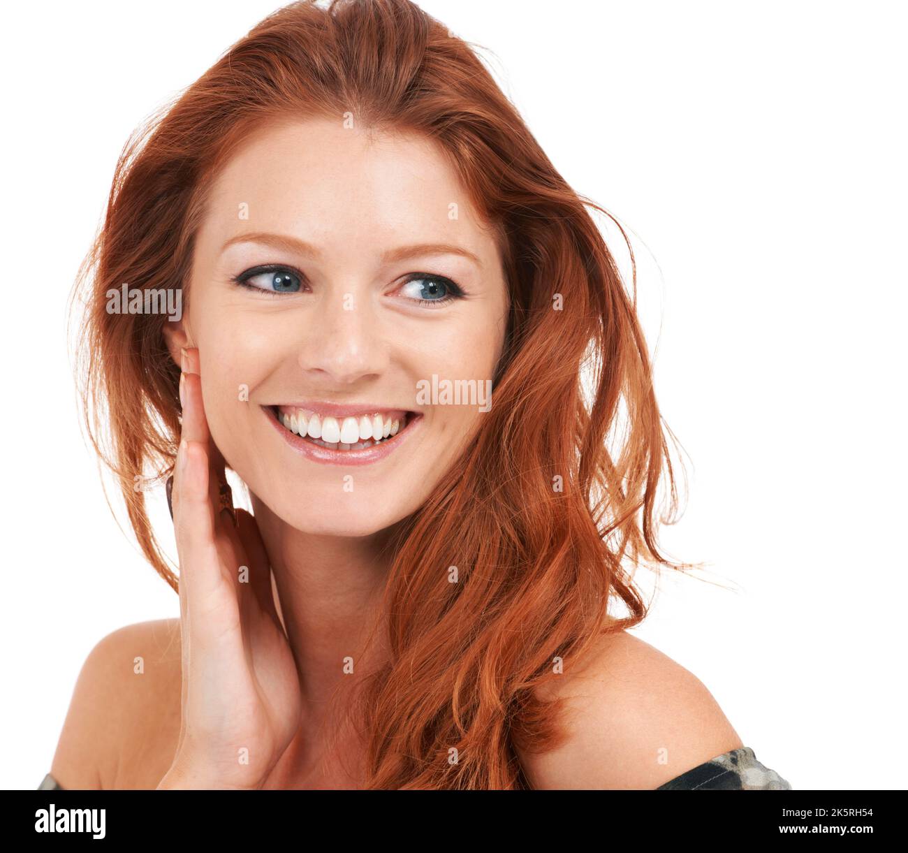 Picture of grace and charm. Happy young woman smiling into copyspace ...
