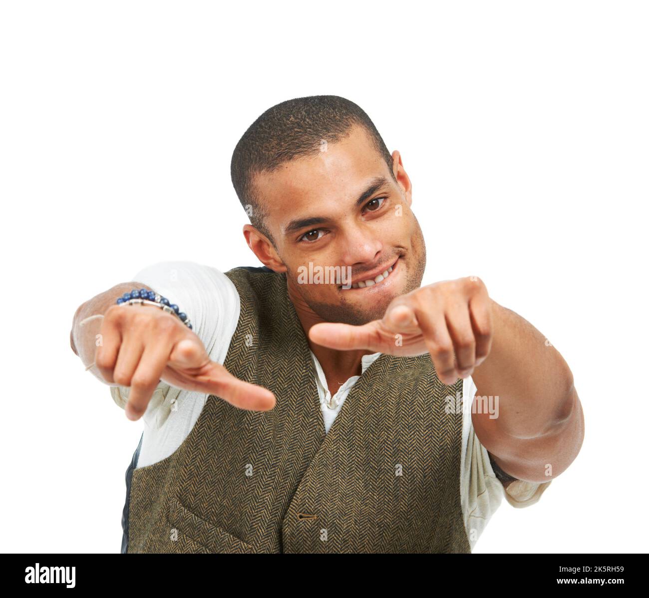 Youve got it going on. Handsome trendy young man motioning ...