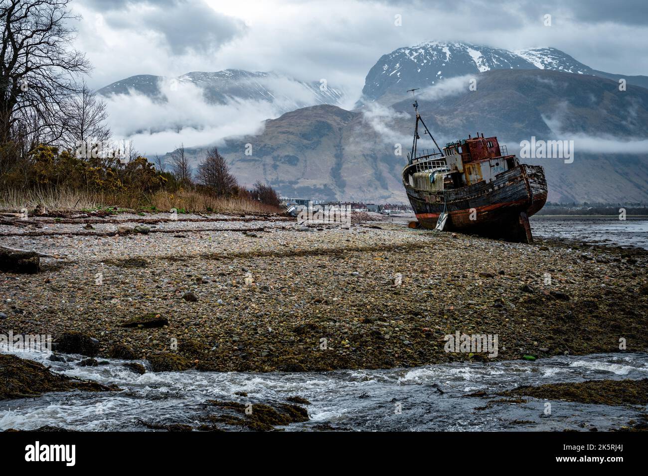 An old boat of Caol, Corpach Shipwreck in the Scottish Highlands, UK ...