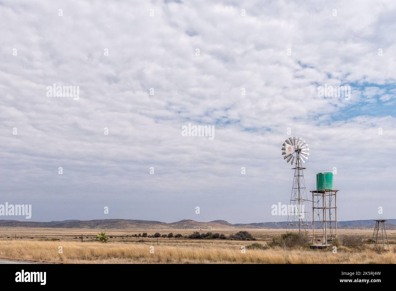 A water-pumping windmill and water tank on a farm near Hanover in the ...