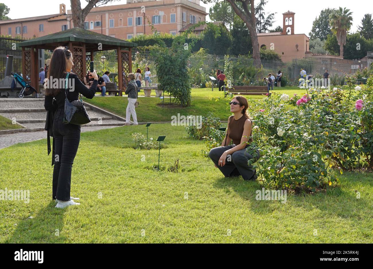 Rome, Italy. 9th Oct, 2022. A woman poses for photos at the Rome Rose ...