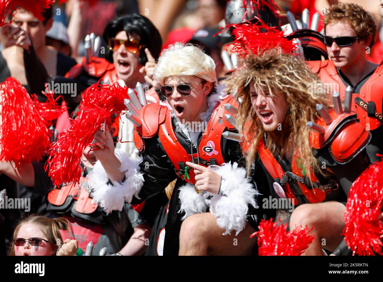 Georgia Bulldog fans cheer during a college football regular season ...