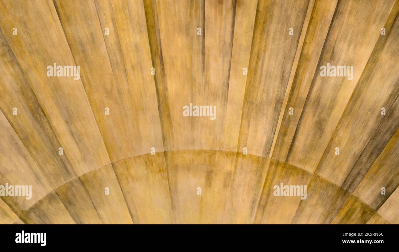 Ocher brown painted pattern with rays in a semicircle on a wall Stock ...