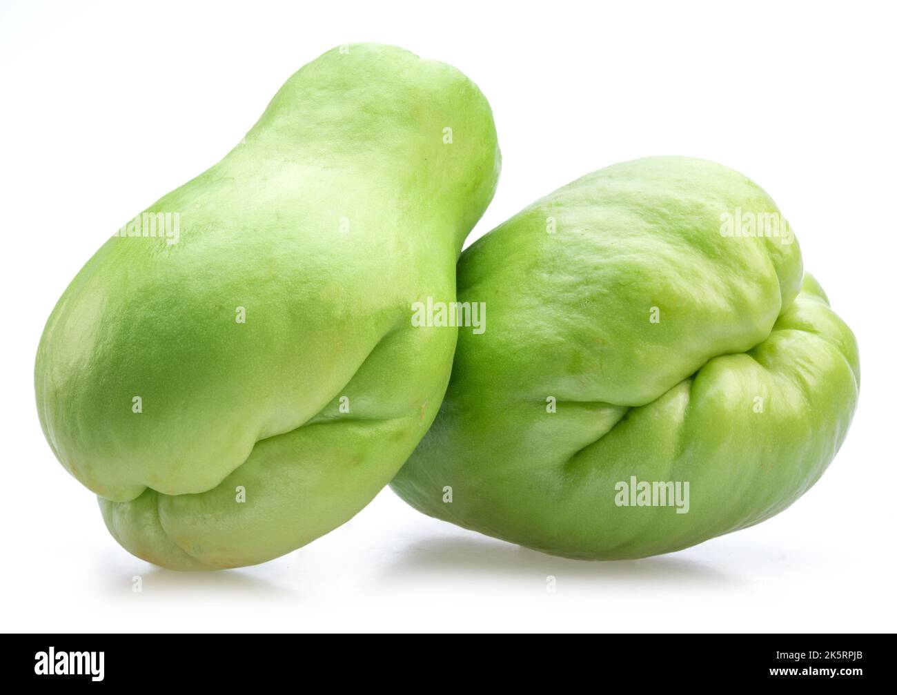 Chayote fruits isolated on white background Stock Photo - Alamy