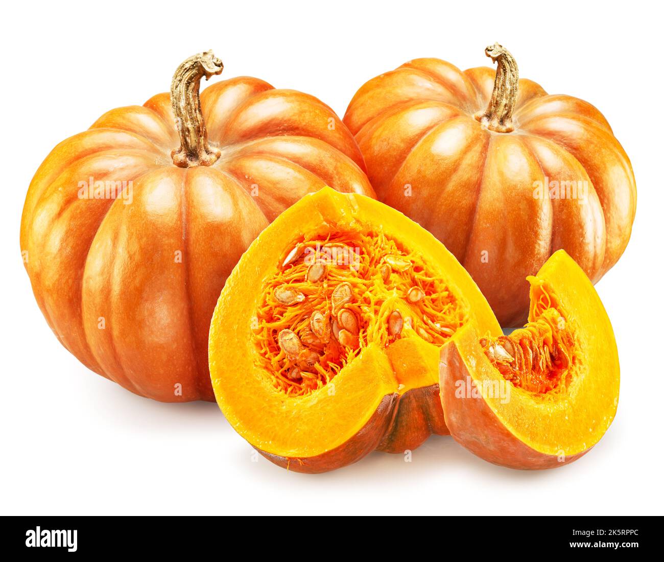 Orange round pumpkins and pumpkin slices isolated on white background ...