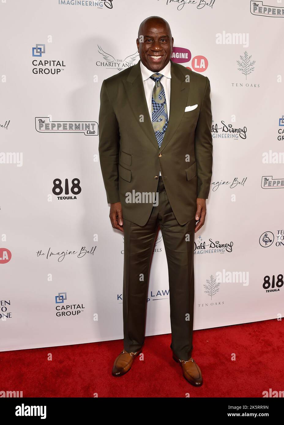 Magic Johnson walking the red carpet at The 7th Annual Imagine Ball ...