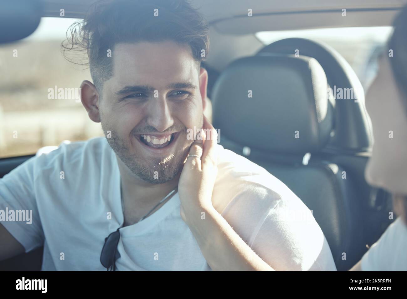 Road trip, love and couple with a real man in a car with his girlfriend ...