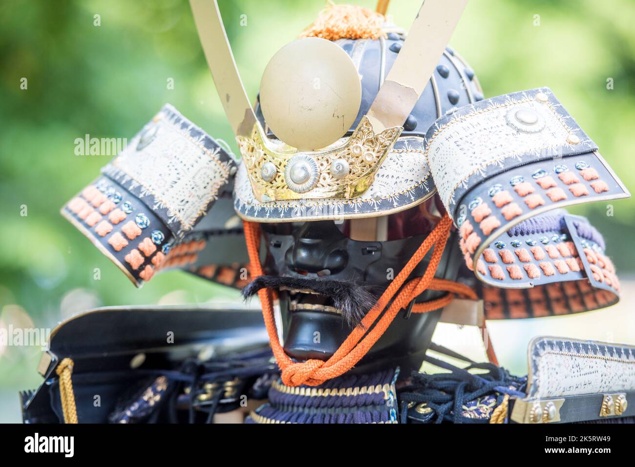 A closeup of a samurai with facial armor Stock Photo - Alamy