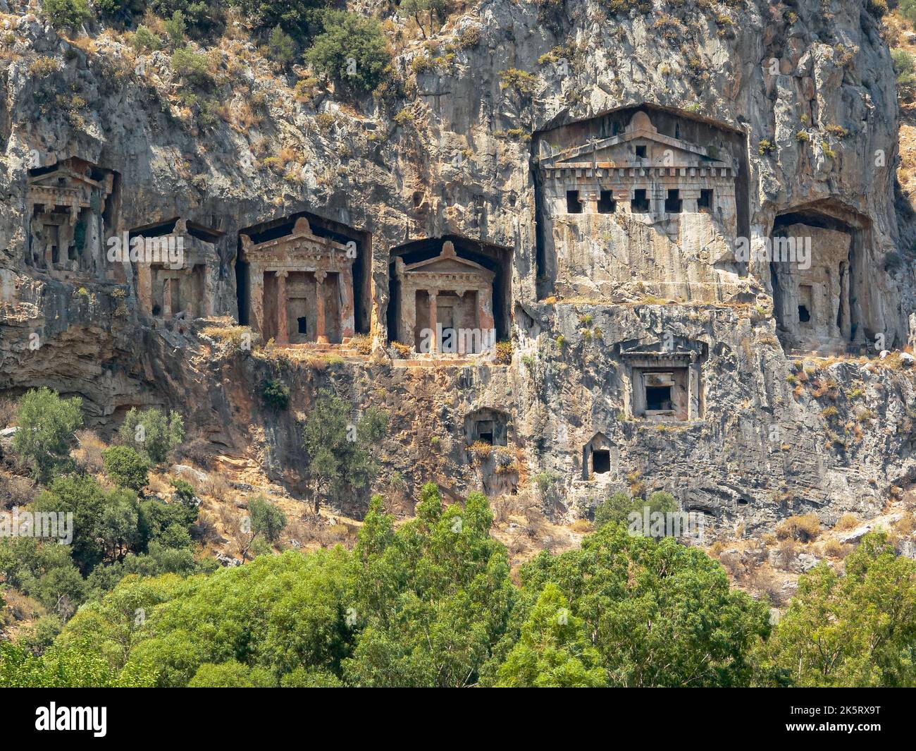 Lycian tombs carved into the rock. View on the Dalyan River in Turkey ...
