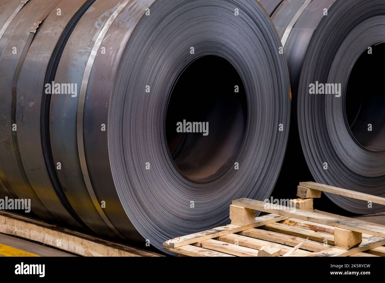 Metail coils stacked in a company warehouse. Steel hot roll coil at ...