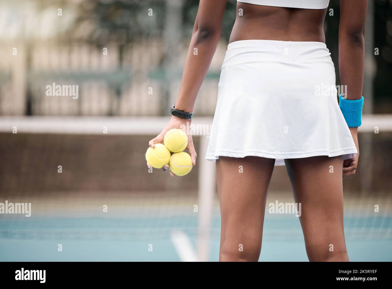 Closeup on the hands of a tennis player holding tennis balls. Tennis ...