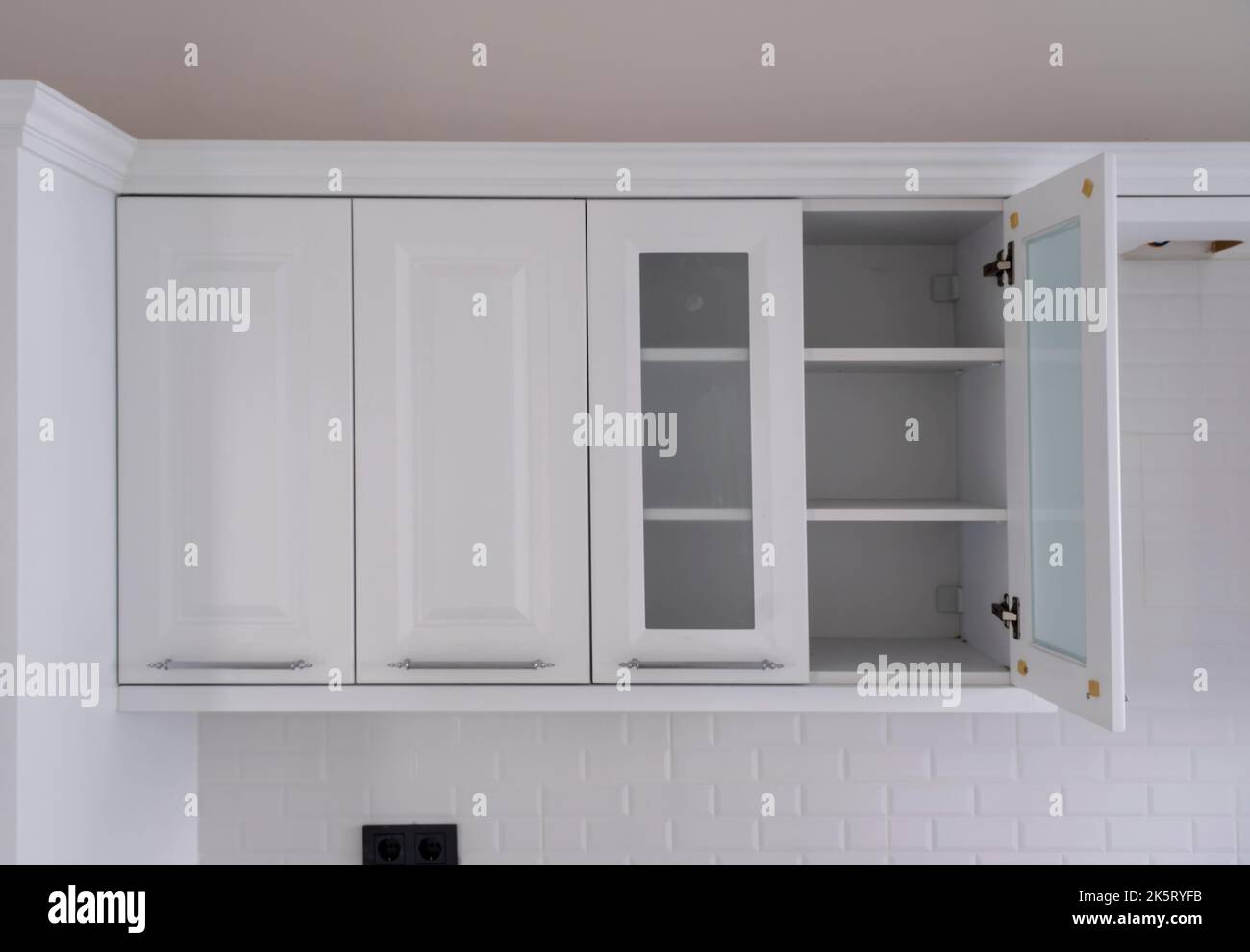 The design of the kitchen room. Kitchen cabinet with door open Stock ...