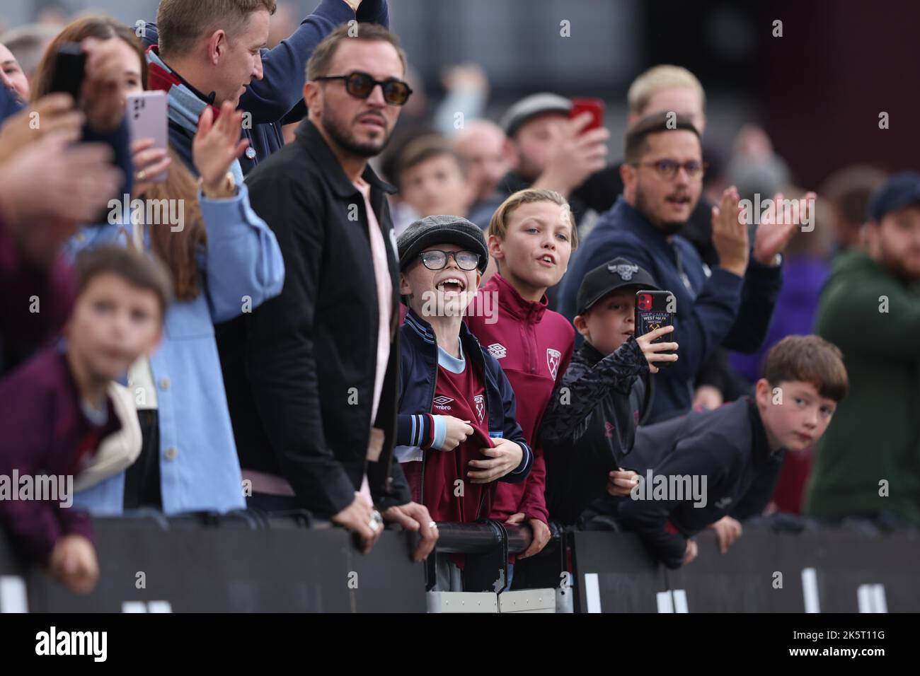 Young West Ham fans cheer during the Premier league match between West ...