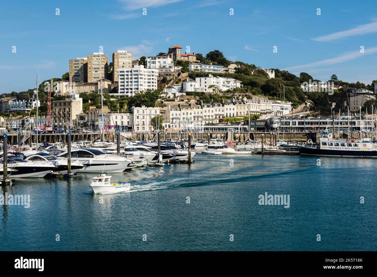 Boats moored in harbour from Princess Pier, Torquay, Devon, England, UK ...