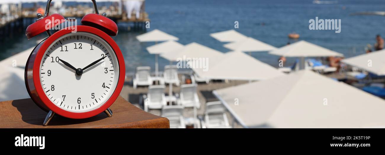 Alarm clock for ten o'clock on background of resort beach Stock Photo ...