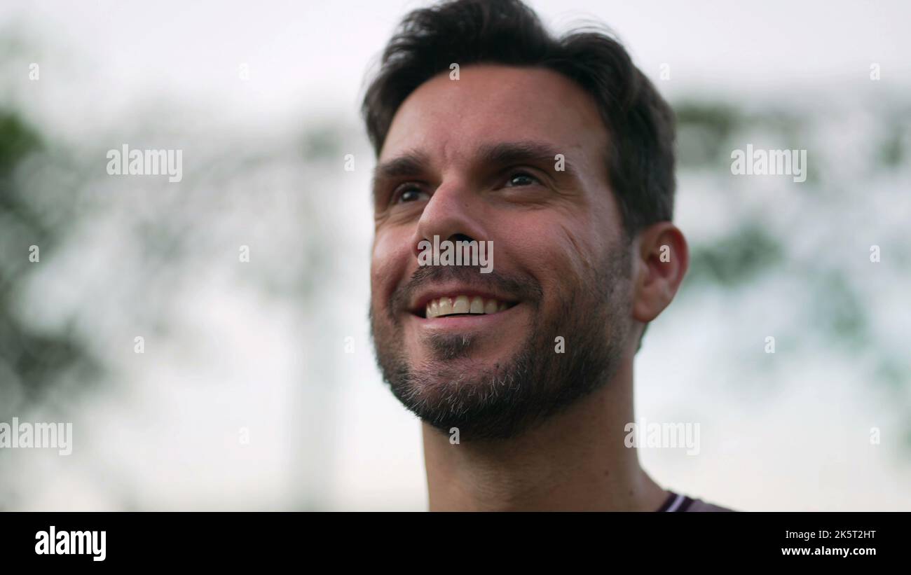 Spiritual man closing eyes in contemplation outdoors. Carefree person ...