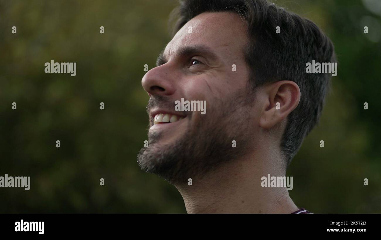 Spiritual man looking up at sky with HOPE and FAITH. Contemplative ...