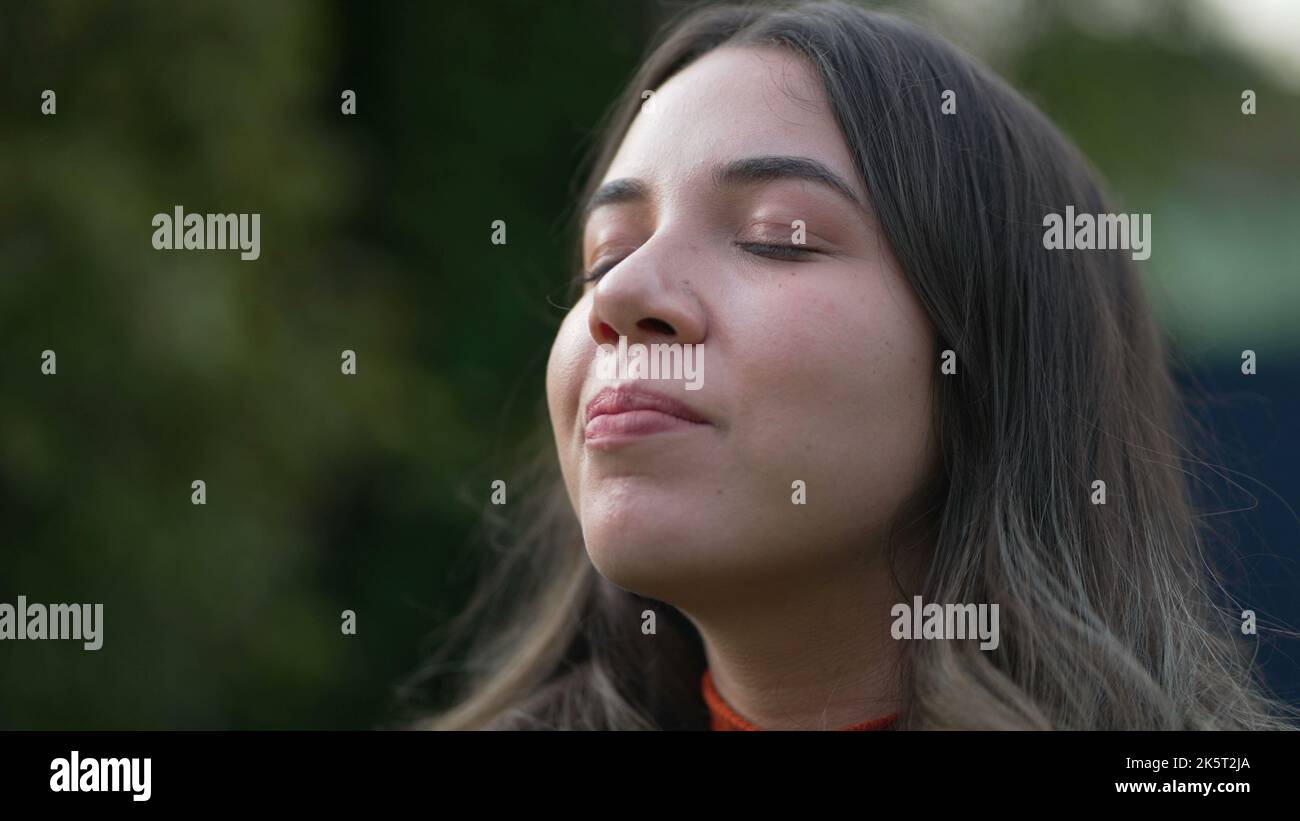Serene peaceful young woman closing eyes in contemplation. Spiritual ...