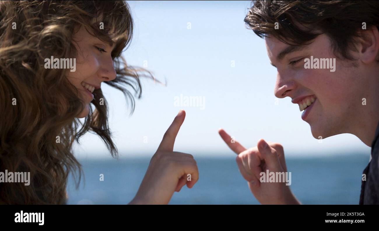 FERDIA WALSH-PEELO and EMILIA JONES in CODA (2021), directed by SIAN HEDER. Credit: Vendome ...