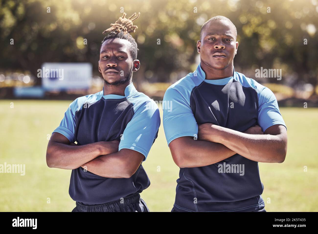 Portrait two young african american rugby players standing with their ...