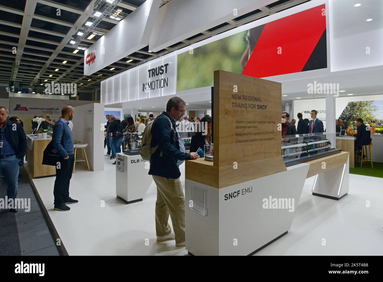 People looking at the CAF trade stand, the Spanish train manufacturer, at Innotrans, the ...