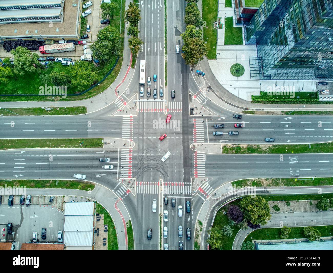 The view of the intersection with cars and the West 65 skyscraper from ...