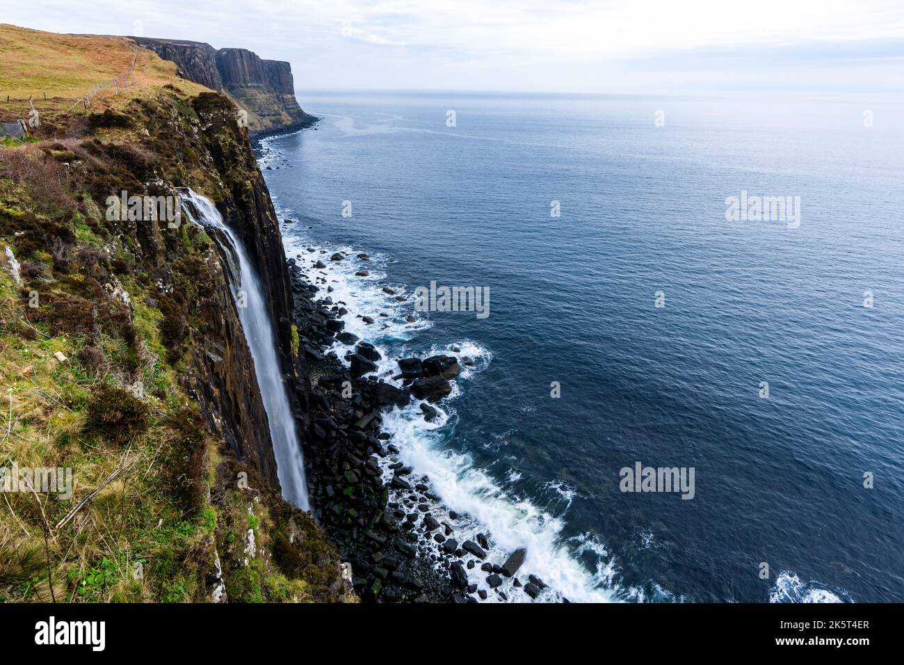 The beautiful view of Mealt falls, also named Kilt Rock Waterfall. Isle ...