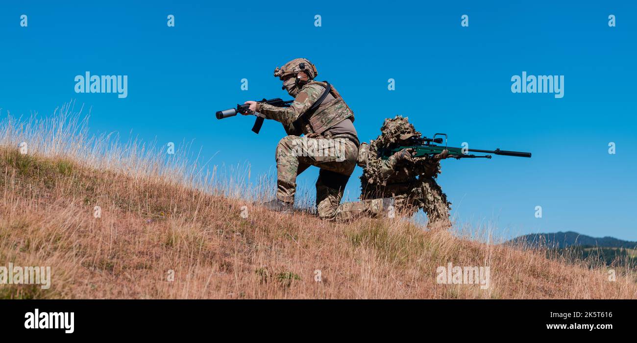 A sniper team squad of soldiers is going undercover. Sniper assistant ...