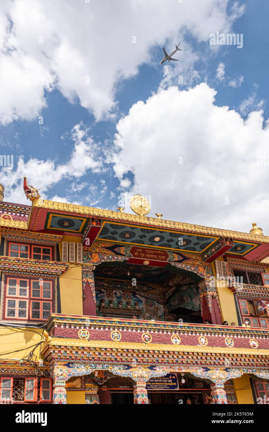 Plane flying over the monastary at Swayambhnath Temple Stock Photo - Alamy