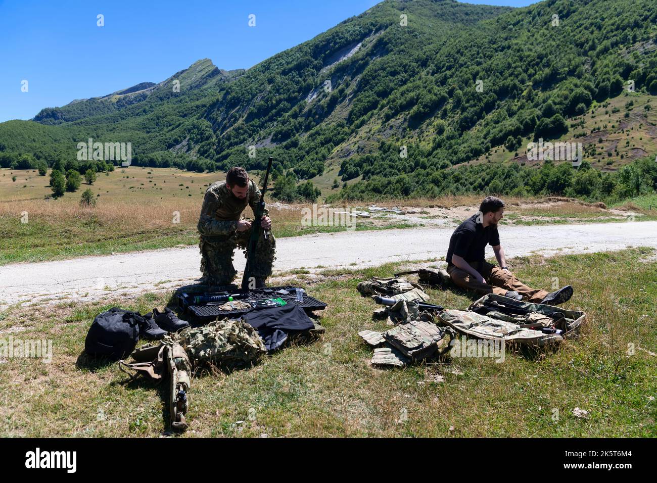 special operations soldiers team preparing tactical and communication ...