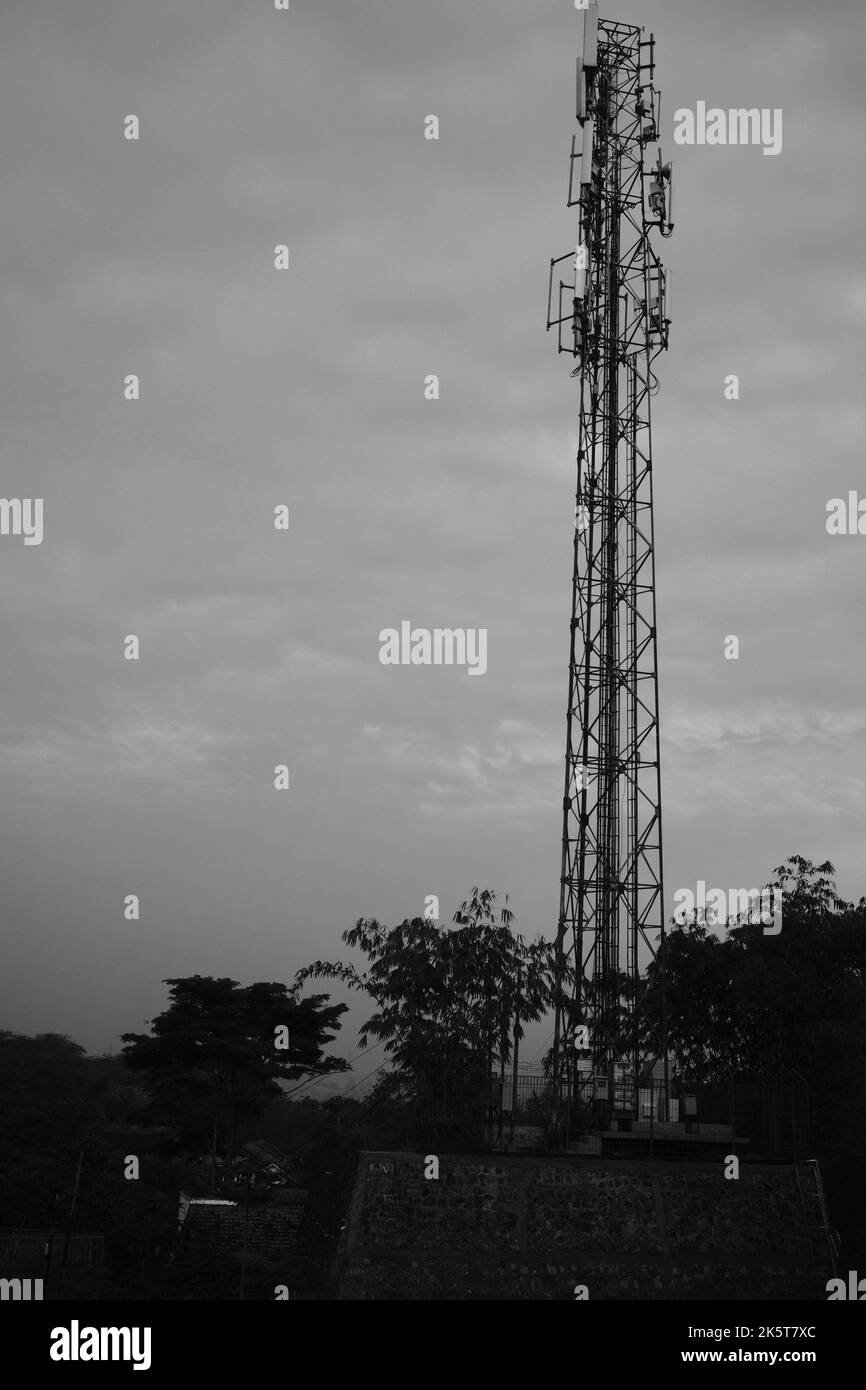 Signal antenna, Monochrome photo of signal tower built on vacant land ...
