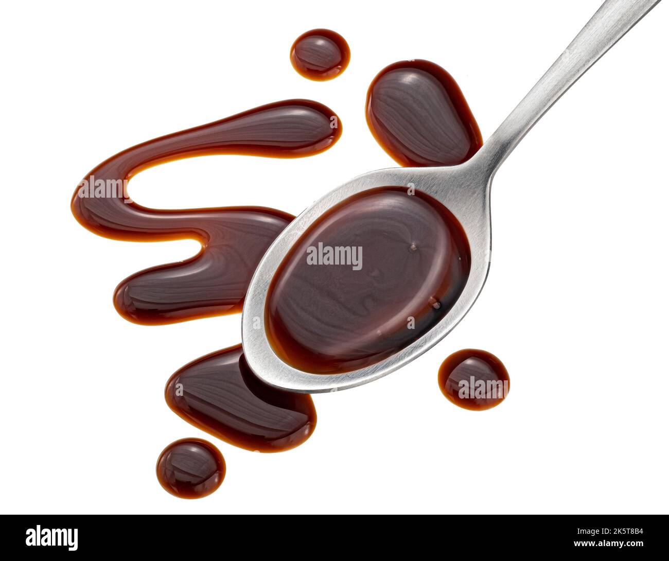 Balsamic sauce in spoon isolated on white background, top view Stock ...
