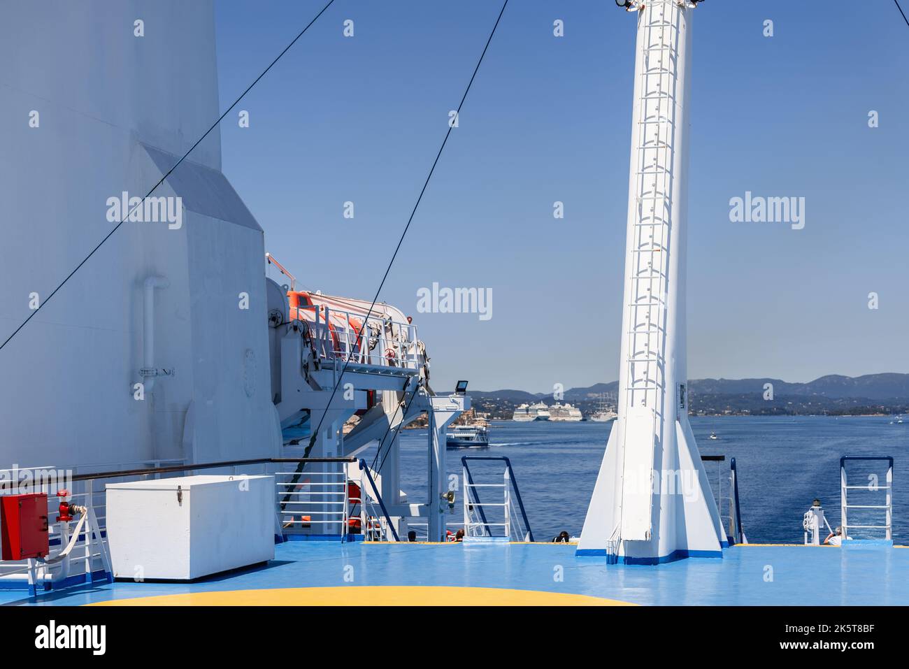 The upper blue and white observation deck of a passenger ferry plying ...