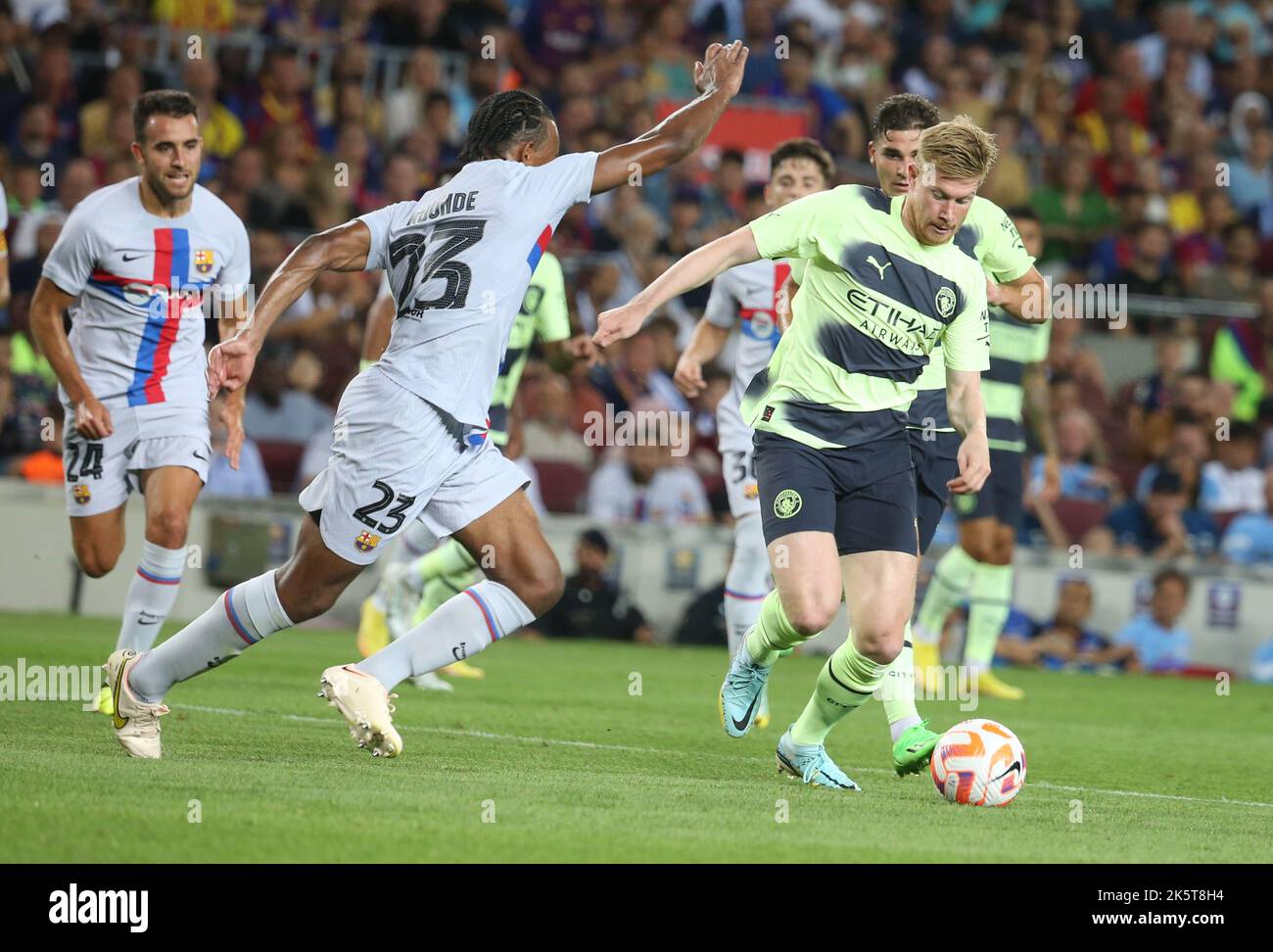 Fred De Bruyne of Manchester City and Jules Kounde of FC Barcelone ...