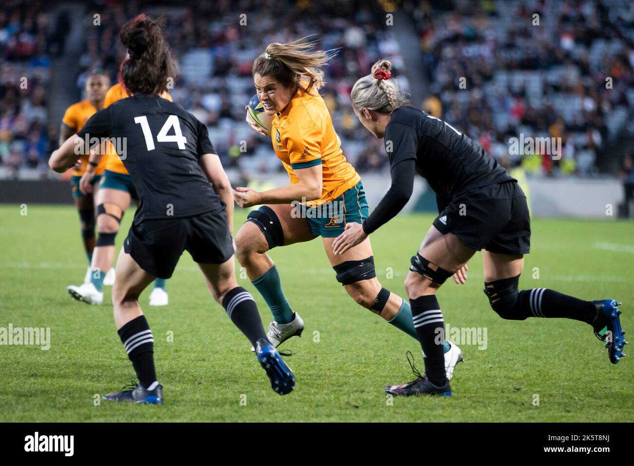 Australia's No.8 Grace Hamilton takes on the New Zealand defence during ...