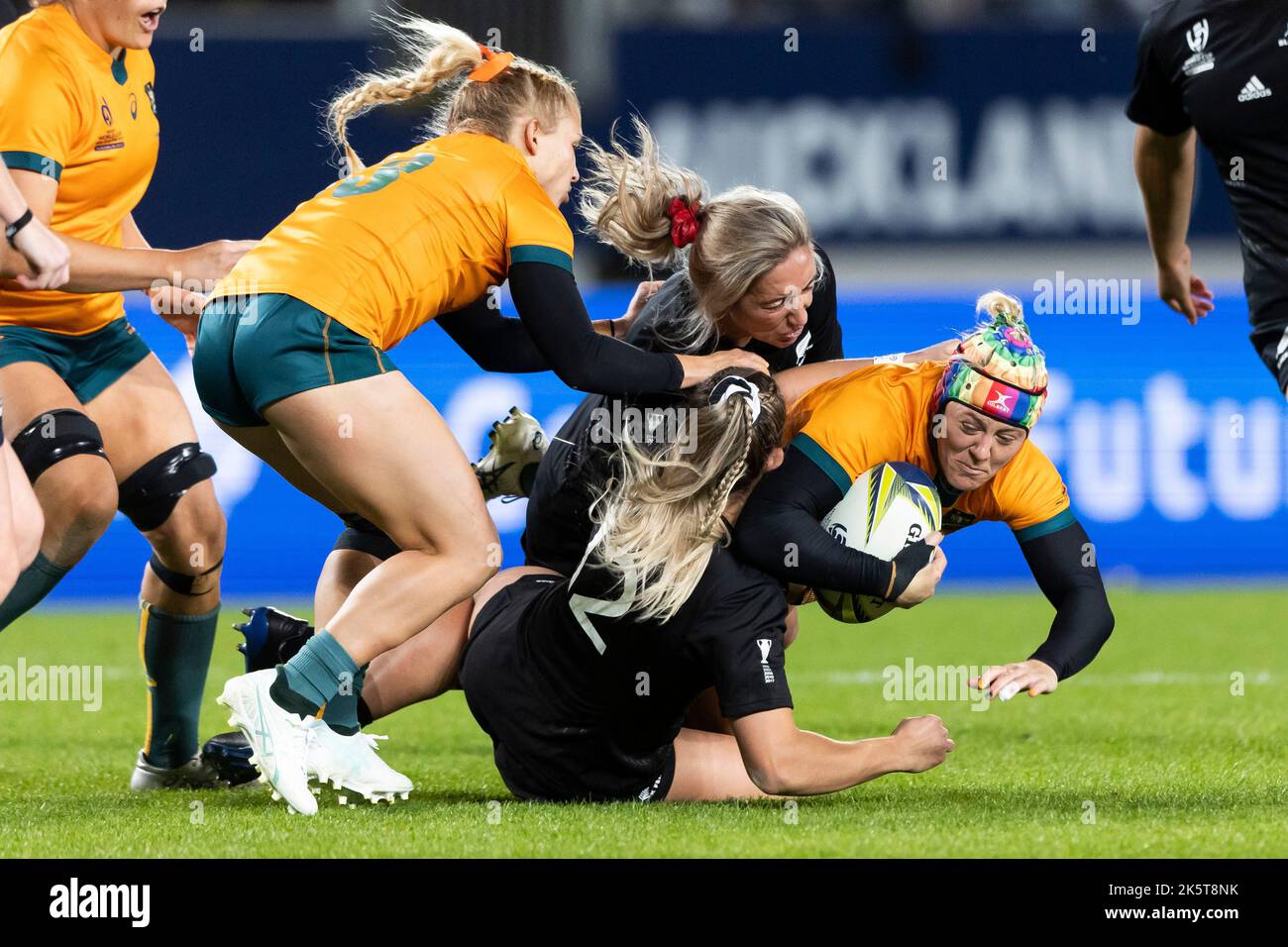 Australia's Sharni Williams is tackled by New Zealand's Sarah Hirini ...