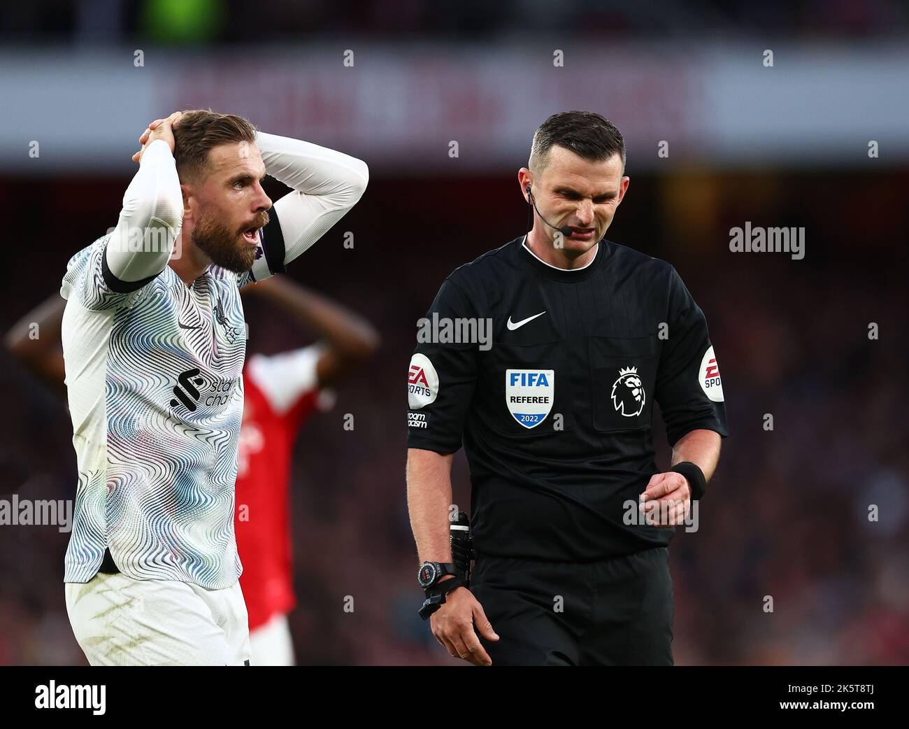 London, UK. 9th Oct, 2022. Jordan Henderson of Liverpool with Referee ...