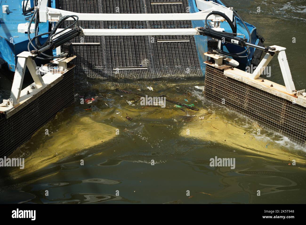 garbage plastic rubbish water sea cleaner boat floating machine Stock ...