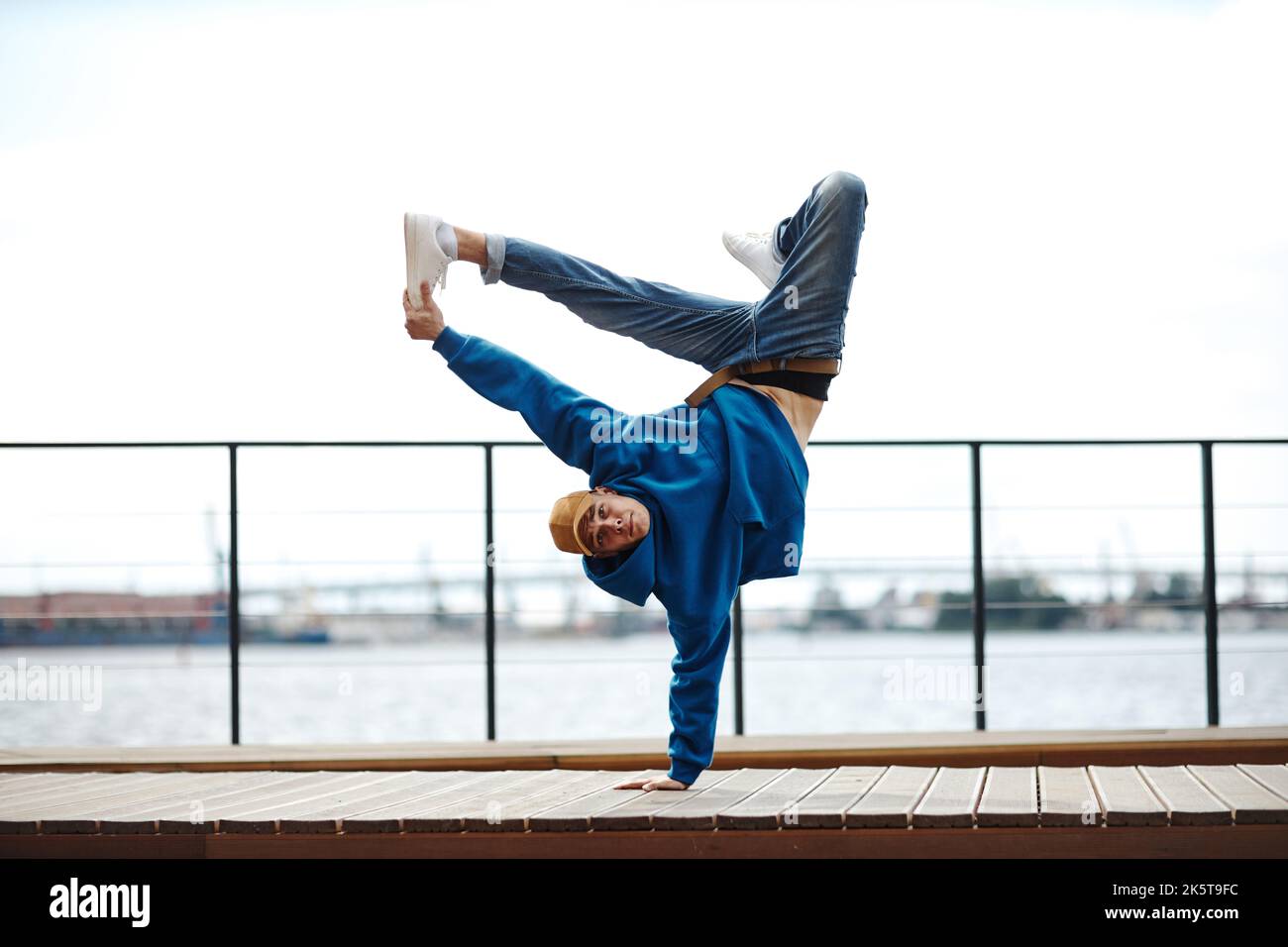 Young man dancing outdoors hi-res stock photography and images - Alamy