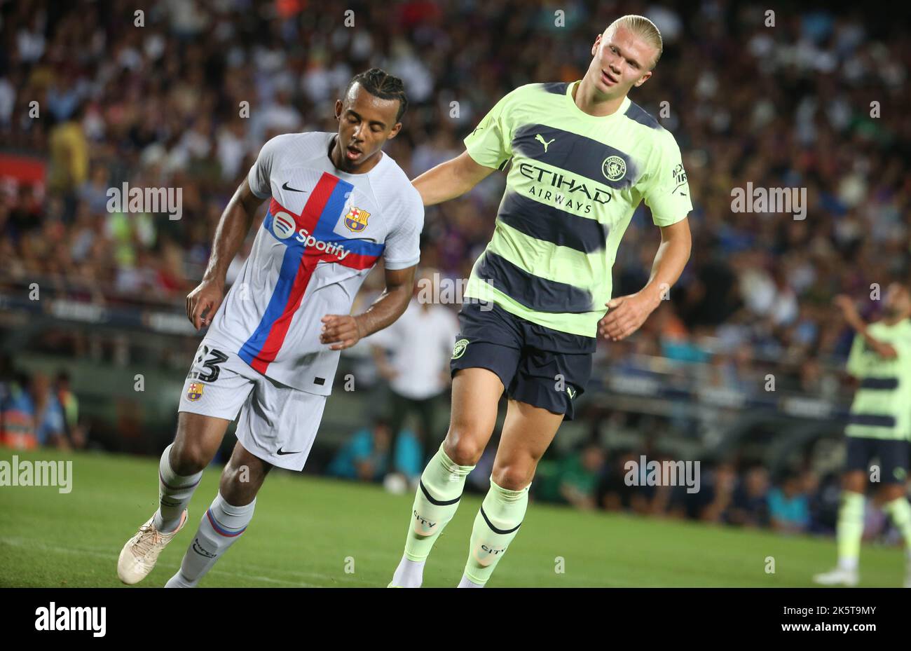 Erling Haaland of Manchester city and Jules Kounde of FC Barcelone ...