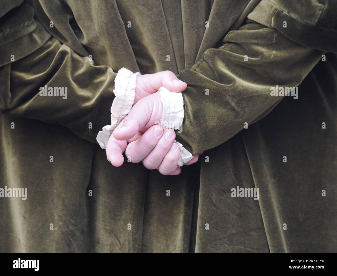 crossend hands man wearing medieval dress detail Stock Photo - Alamy