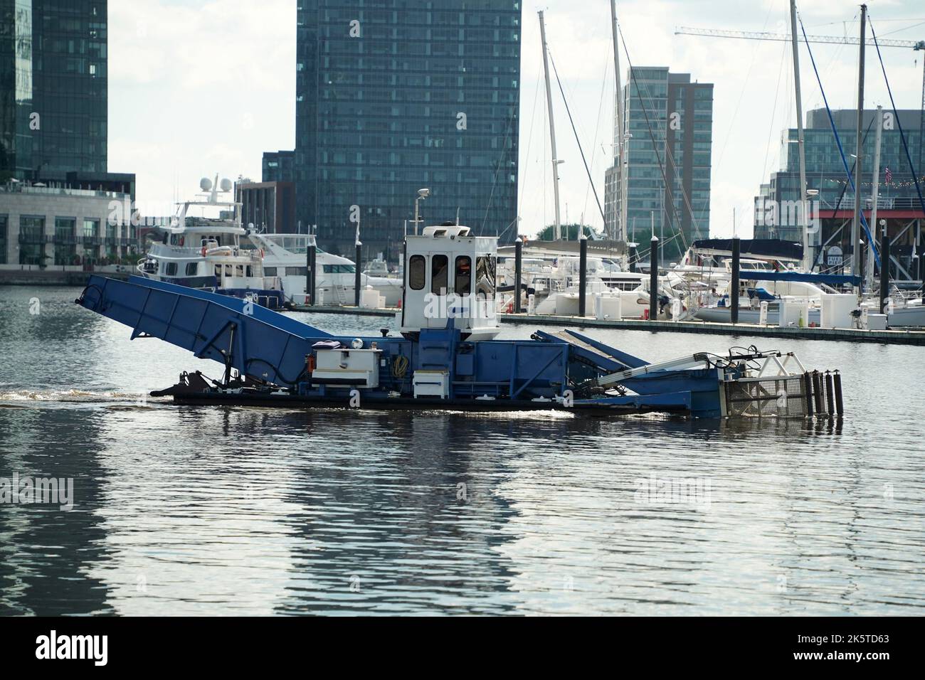 garbage plastic rubbish water sea cleaner boat floating machine Stock ...