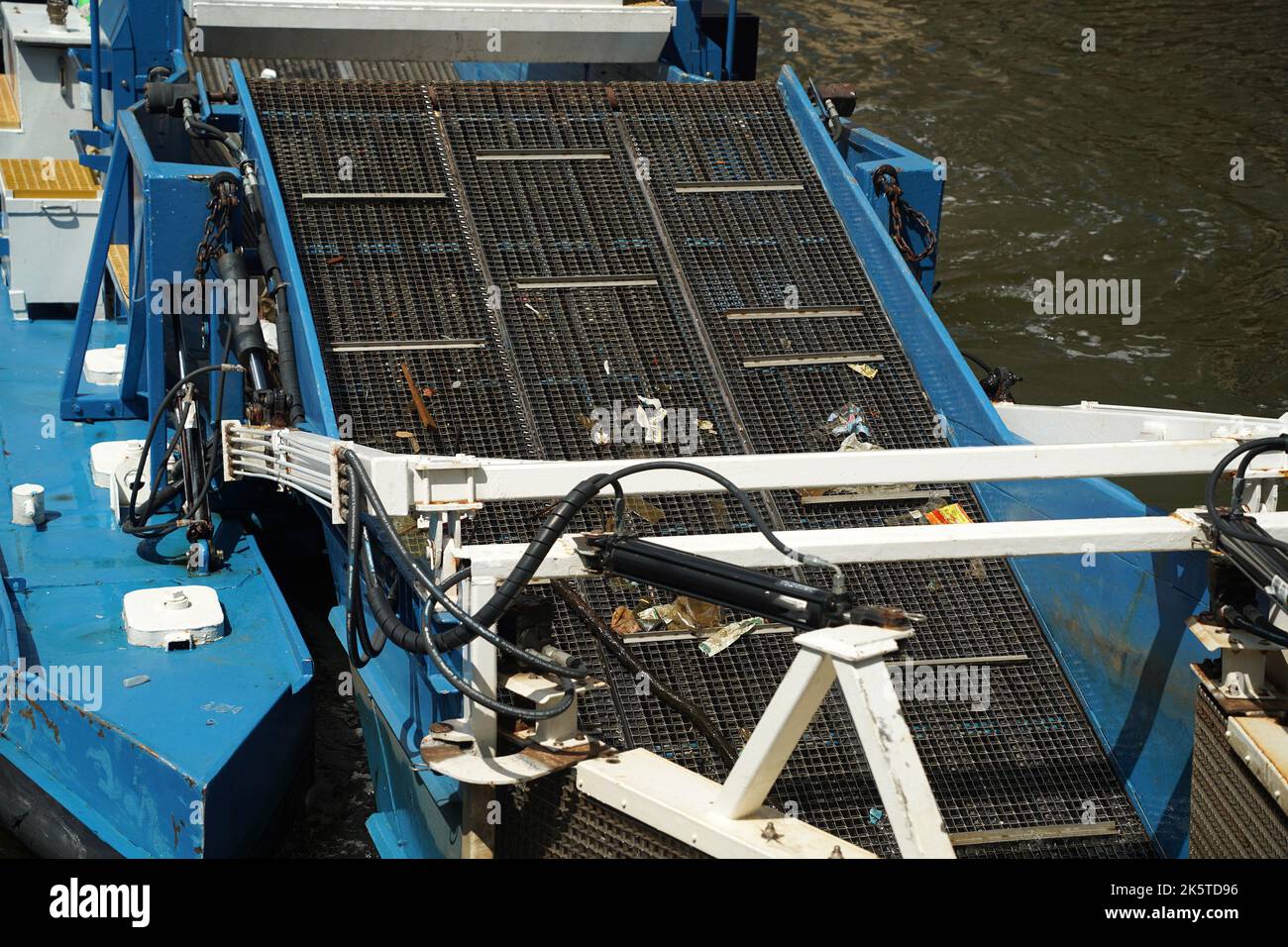 garbage plastic rubbish water sea cleaner boat floating machine Stock ...