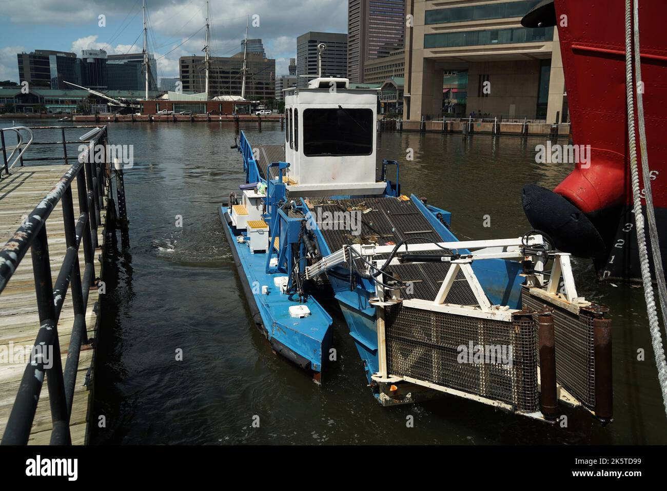 garbage plastic rubbish water sea cleaner boat floating machine Stock ...