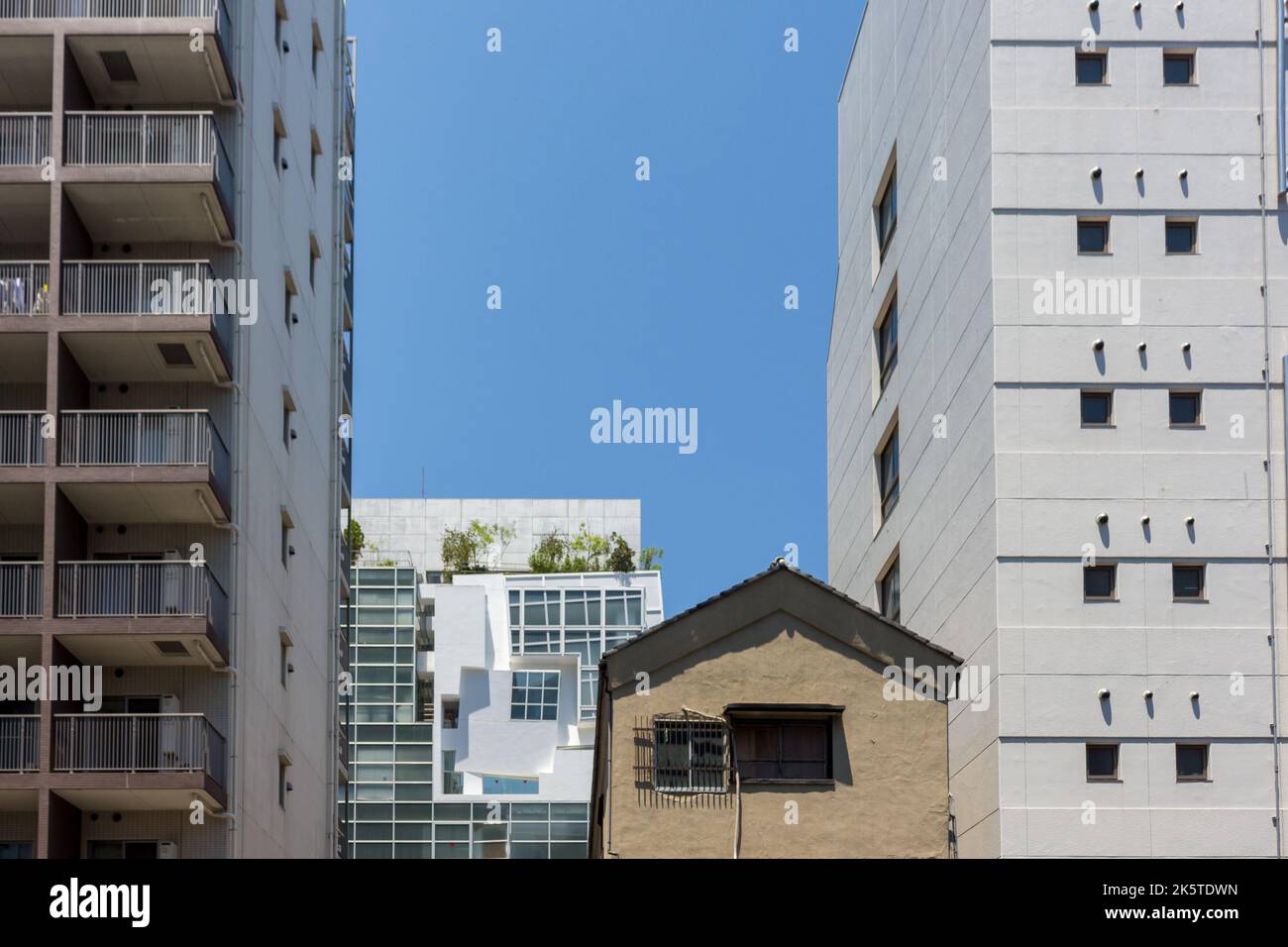 Contrasting old and modern buildings, viewed from the Kanda river ...