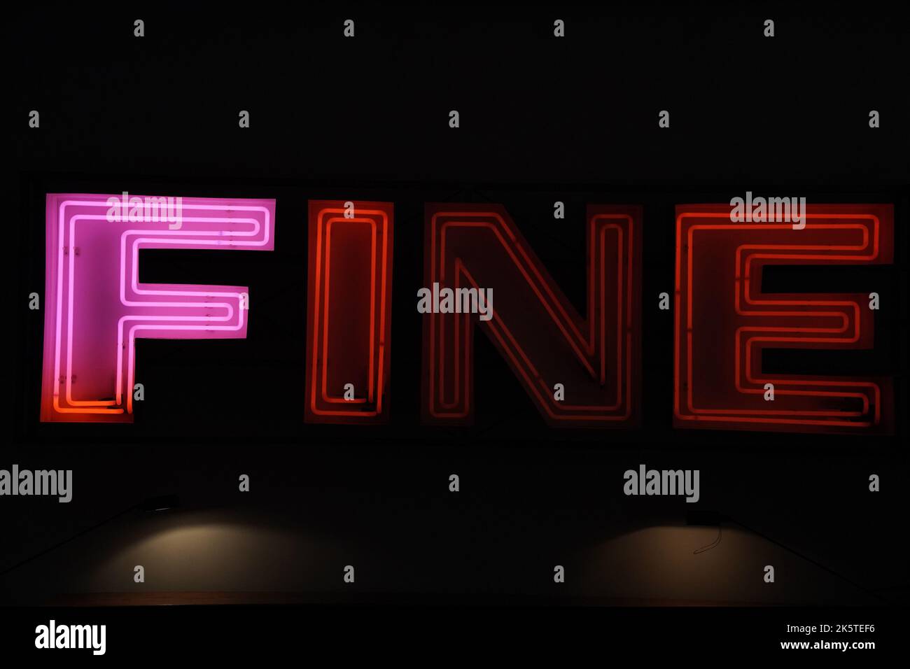 fine neon sign on black background Stock Photo - Alamy
